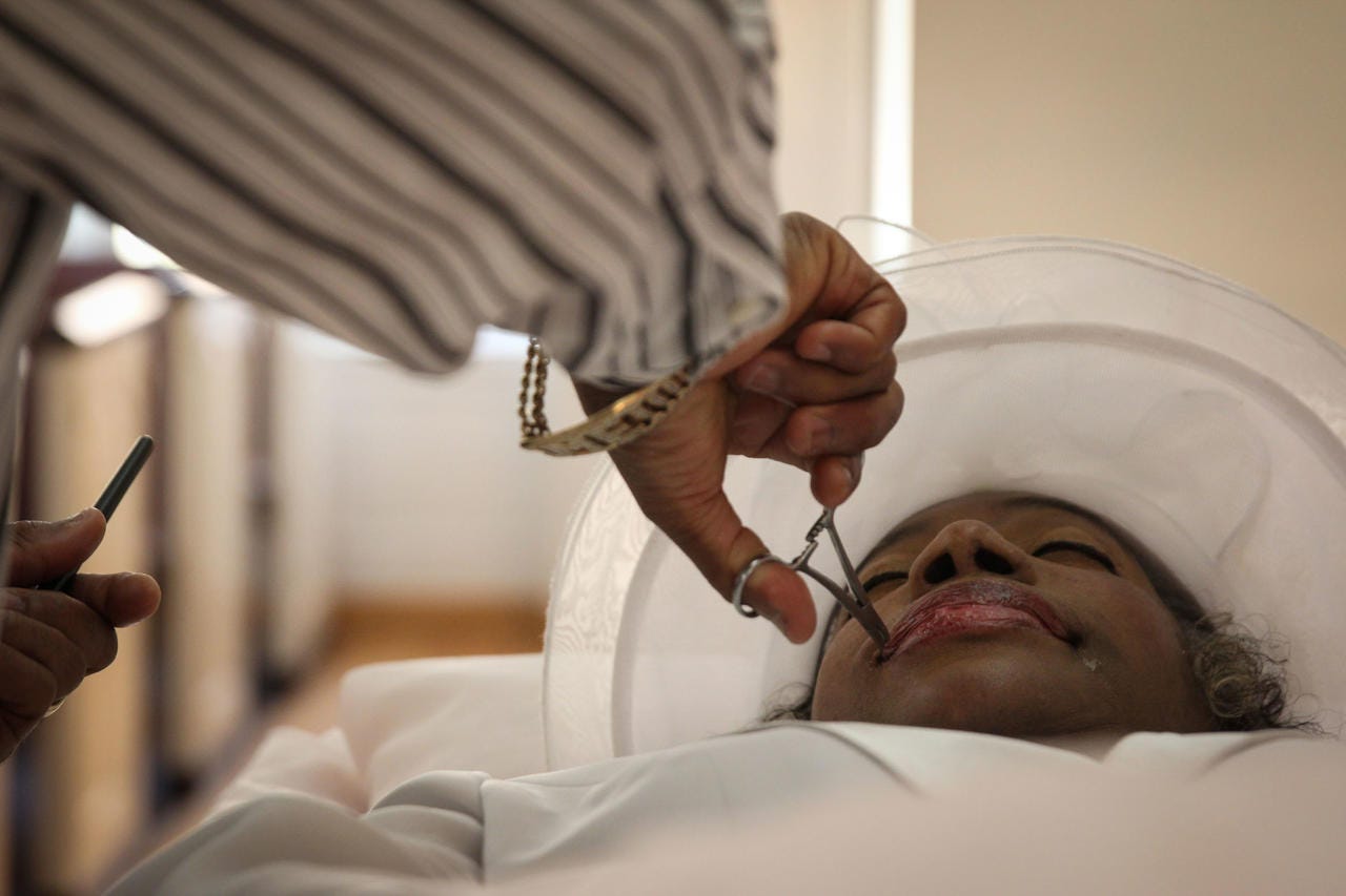 Painting Death's Face with a Smile - by Isabel Riofrío