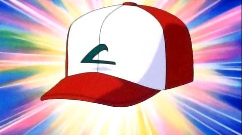 What is the Symbol on Ash Ketchum's Hat?