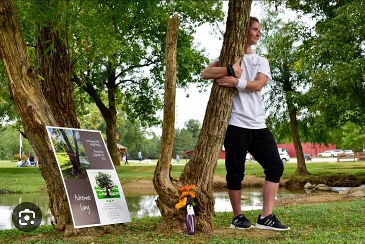 UGANDAN BREAKS WORLD RECORD FOR LONGEST TREE HUG